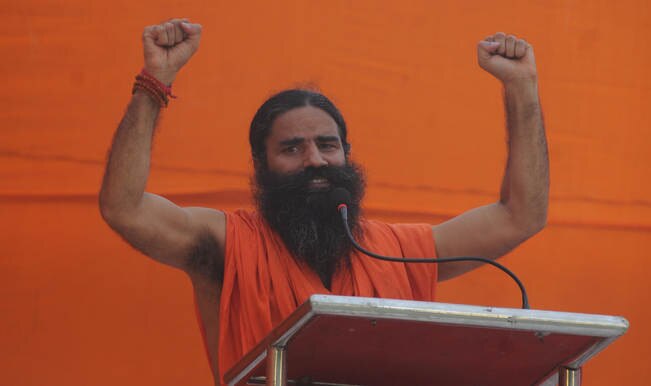 Arvind Kejriwal should be with Modi not Congress: Ramdev | India.com
