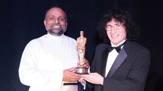 Houston’s Rev. Saju Mathew Receives Doctorate and Prestigious Merlin ...