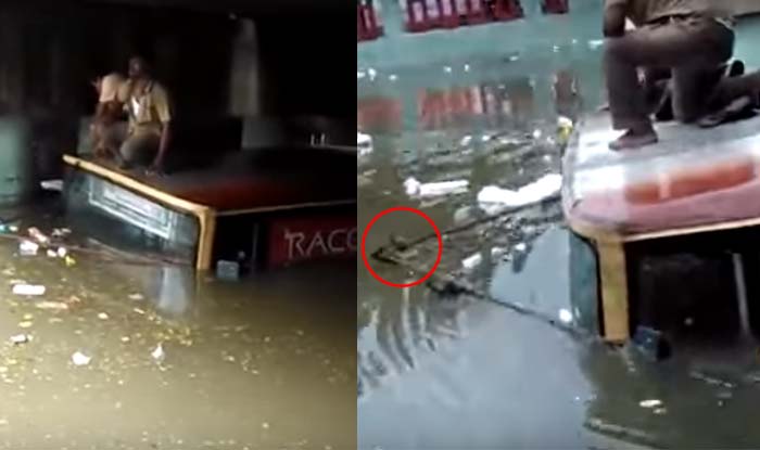 Chennai citizens dramatically pull out a submerged bus from flooded ...