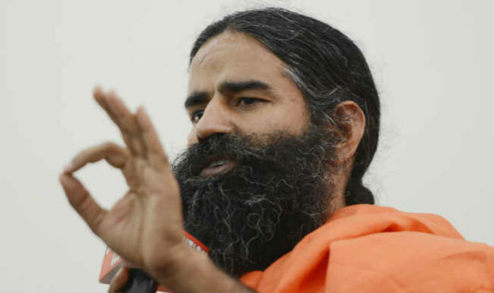 Baba Ramdev praises Lalu Prasad Yadav, seeks his good health | India.com