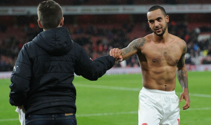 Arsenal’s Theo Walcott delights young fan by celebrating with him on ...