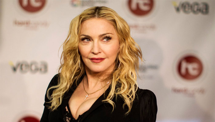 Madonna turns to 25-year-old model for comfort | India.com