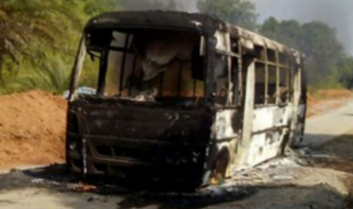 Naxals torch bus in Chhattisgarh | India.com Naxals torch bus in Chhattisgarh | India.com