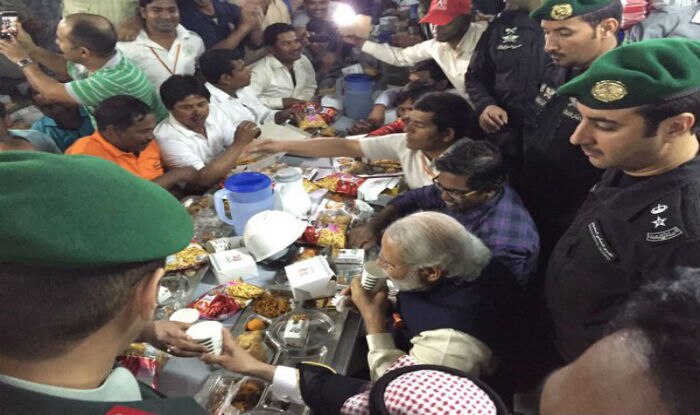 Narendra Modi breaks bread with Indian construction workers in Saudi ...