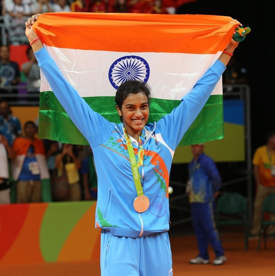 P V Sindhu gets warm welcome, Andhra government felicitates her | India.com