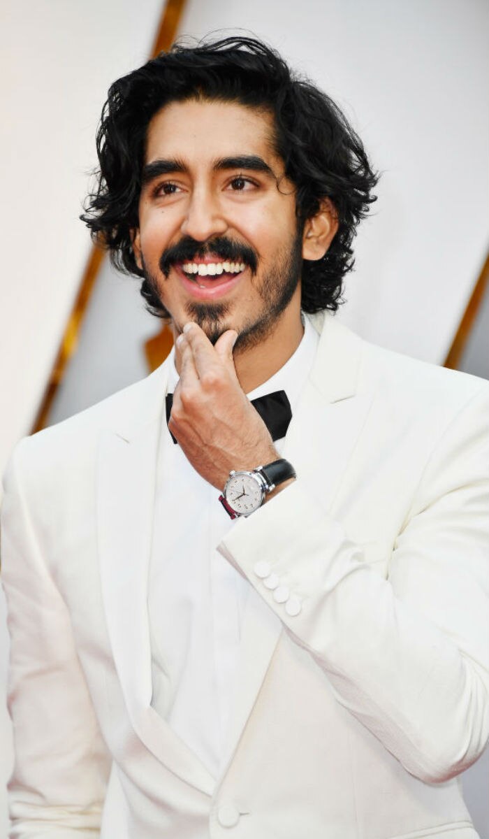 Dev Patel looked every bit the charming gentleman in a white tuxedo at ...