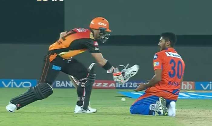IPL 2017: David warner assisted to Basil Thampi after the bowler lost ...