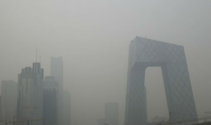 Chinese Man Plans to Tackle Beijing Smog With Hand-Held Fans | India.com