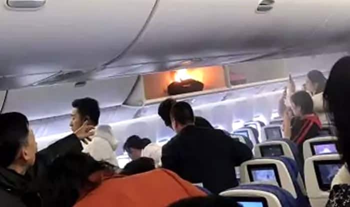 Cabin Baggage Catches Fire in Flight, Video Shows Crew and Passenger ...