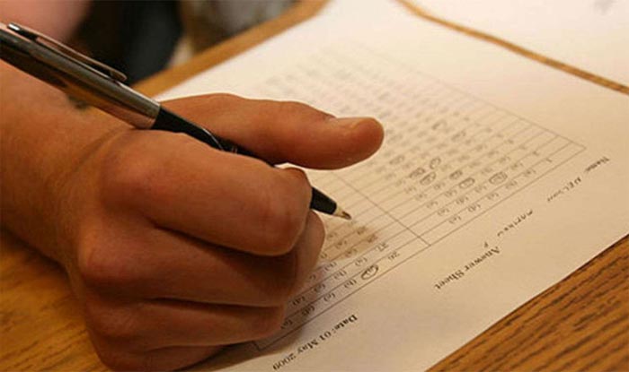 MP: Video of Students Checking Exam Copies Goes Viral | India.com