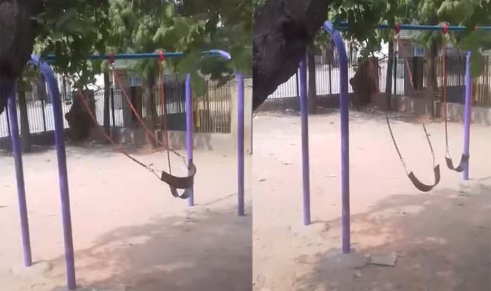 Swing Moves Back And Forth in Children’s Park Without Any Occupant ...