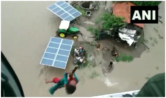 IAF Personnel Rescues Girl in Flood-affected Jamnagar | Watch Video ...