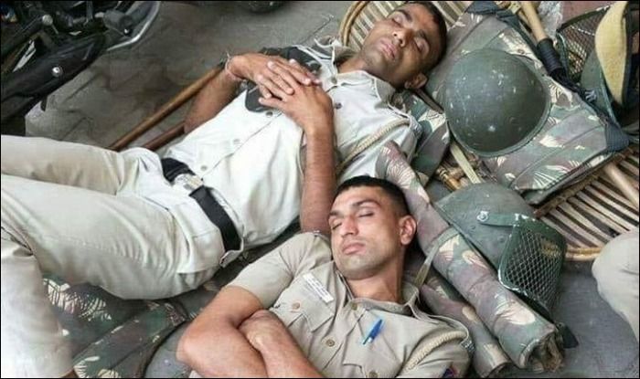 Big Salute! Twitterati’s Hearts Melt Over Viral Picture of Two Cops ...