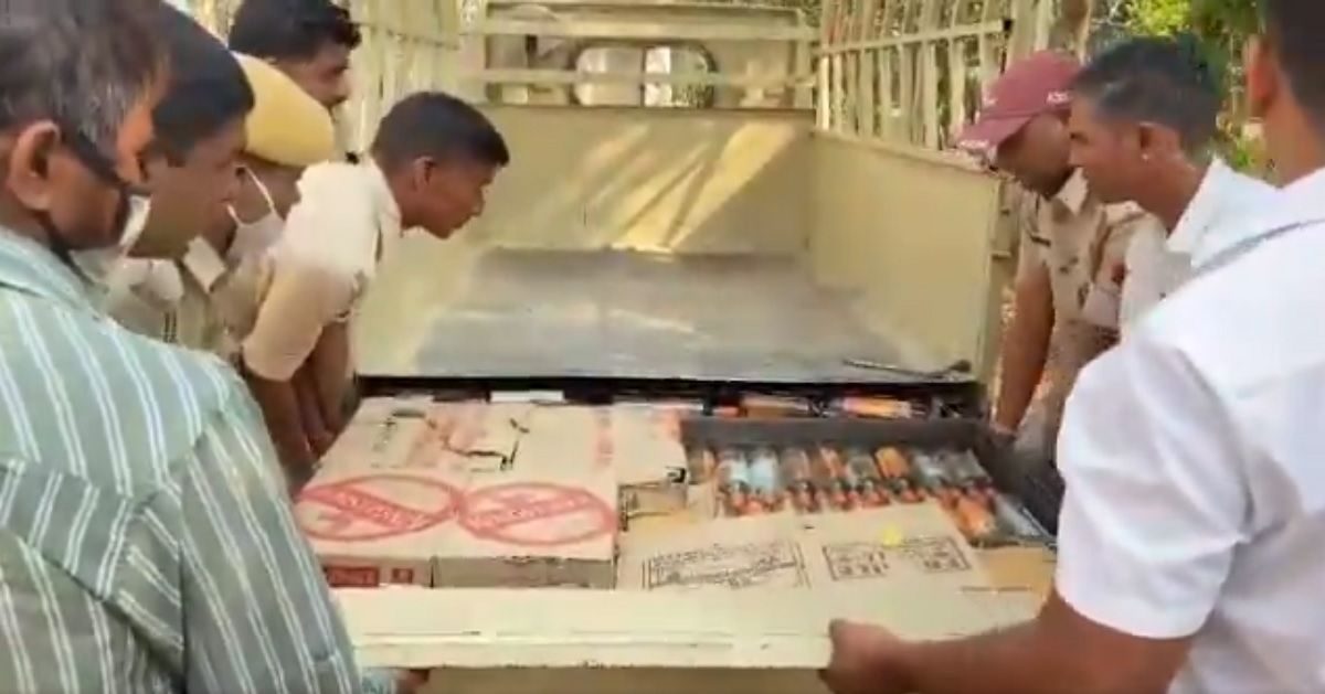 Viral Video: Police Seize Truck Trying To Smuggle Liquor In Secret ...