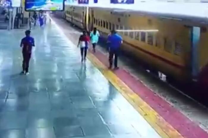 WATCH CCTV Video: Alert Passengers Save Woman from Falling Under Moving ...