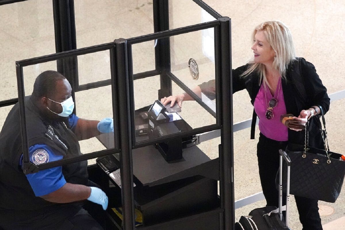 Majority of Americans Want Masks For Travelers: AP-NORC Poll Majority of Americans Want Masks For Travelers: AP-NORC Poll