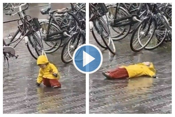 Viral Video: This Adorable Video of A Kid Playing in The Rain Will Make ...