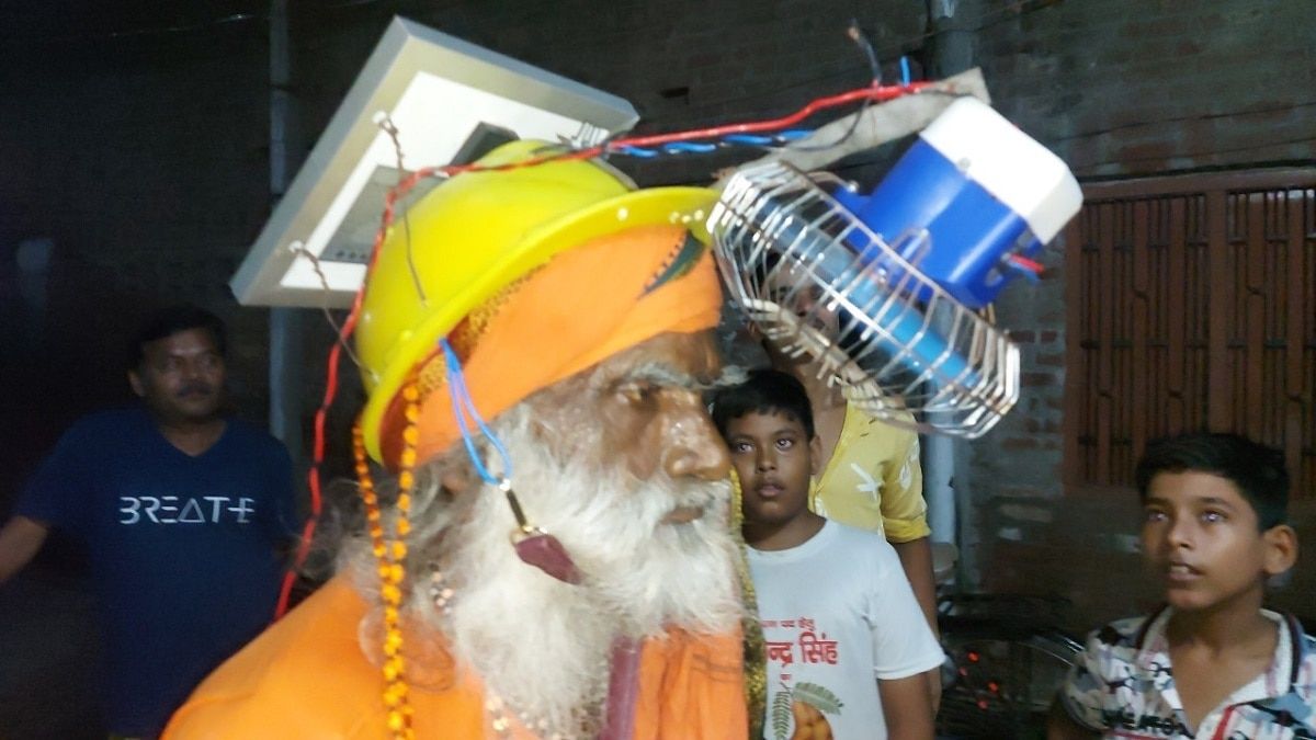 Baba Beats The Heat With Desi Jugaad, Roams Around With Solar Fan ...