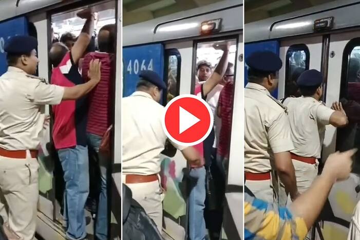 Viral Video Police Help Stuff Passengers Inside Jam Packed Delhi Metro