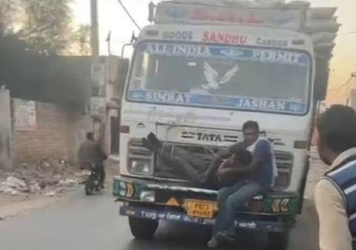Thief Tries To Steal From Truck, Driver Ties Him To Bonnet Enroute ...