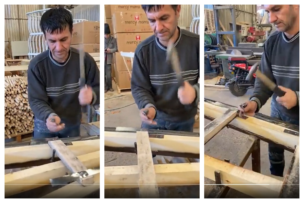 Man Hammers Nails Into Wood Like He Is Possessed By