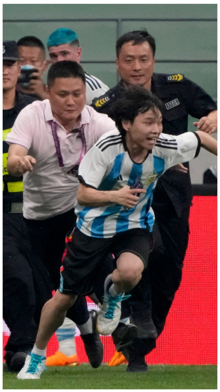 Fan Breaches Security To Hug Lionel Messi | IN PICS