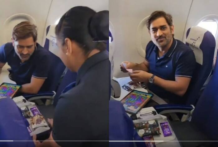 MS Dhoni Lits Up Flight Attendant