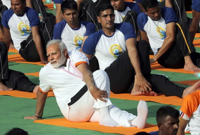 Living La Vida Yoga: PM Modi Will Bend Leaders Into Shape On ...