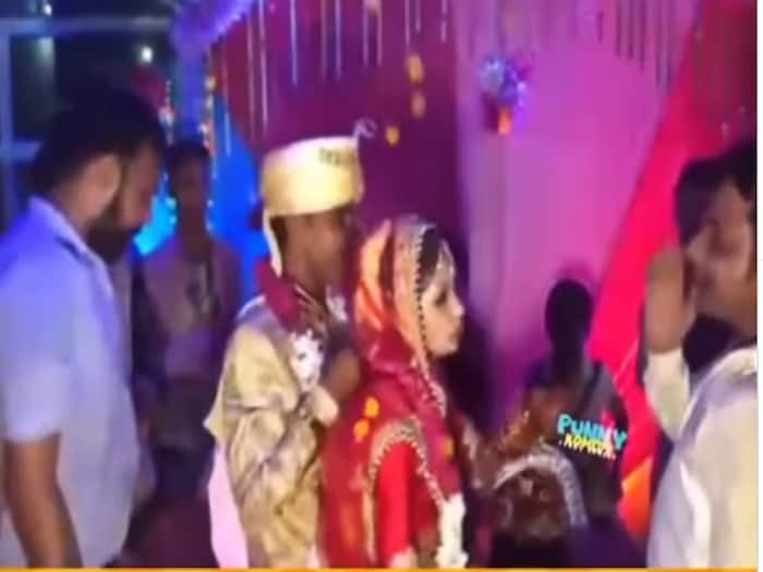 Dulhan Ka Video जयमाला में दुल्हन की मदद कर फंस गया मेहमान सबके सामने पड़ गया जोरदार चांटा