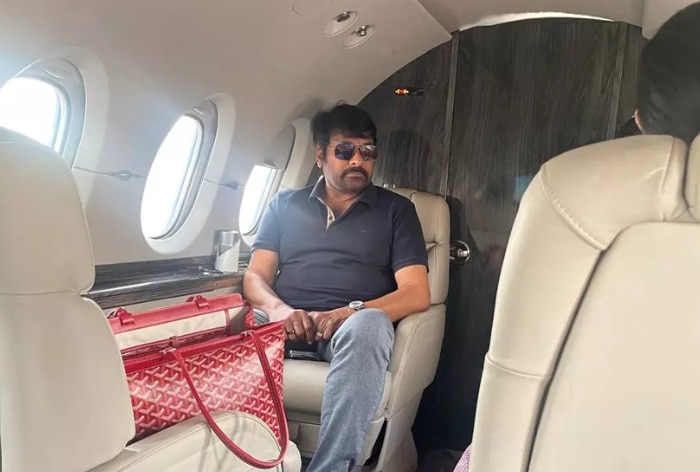 Chiranjeevi Arrives Delhi with Son Ram Charan to Receive Padma ... Chiranjeevi Arrives Delhi with Son Ram Charan to Receive Padma ...