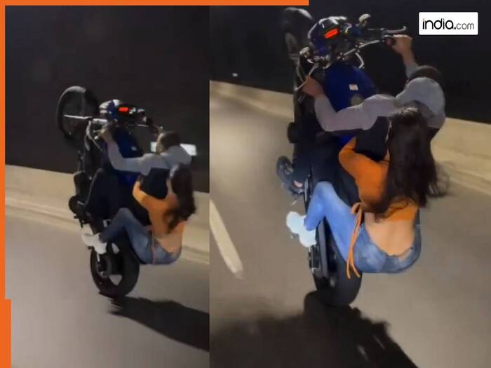 Couple Bike Stunt Video: बाइक स्टंट का ऐसा नजारा पहले कभी नहीं देखा, लड़की की हिम्मत देख हर कोई ...