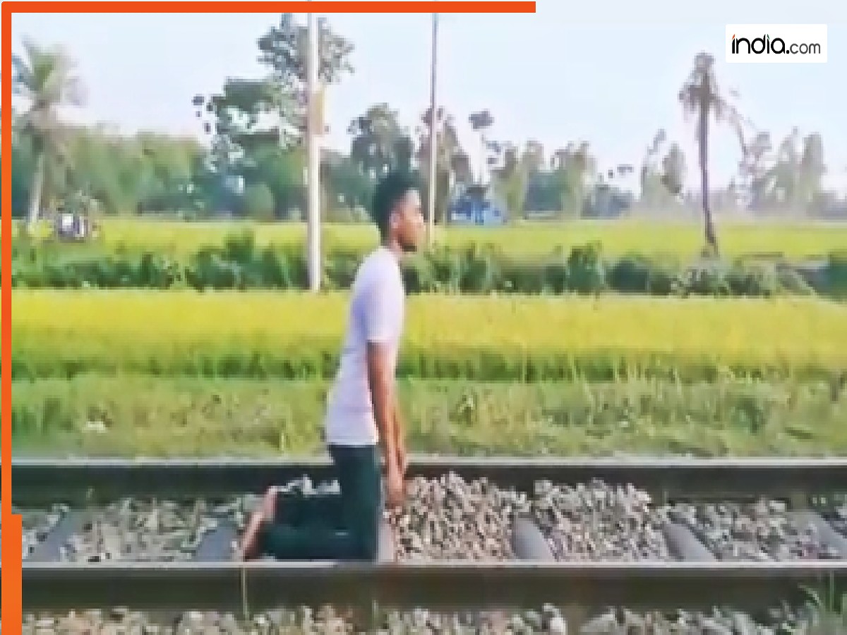 Train Ka Video: रील के लिए चलती ट्रेन के सामने लेट गया शख्स, फिर जो हुआ आंखें फटी रह जाएंगी ...